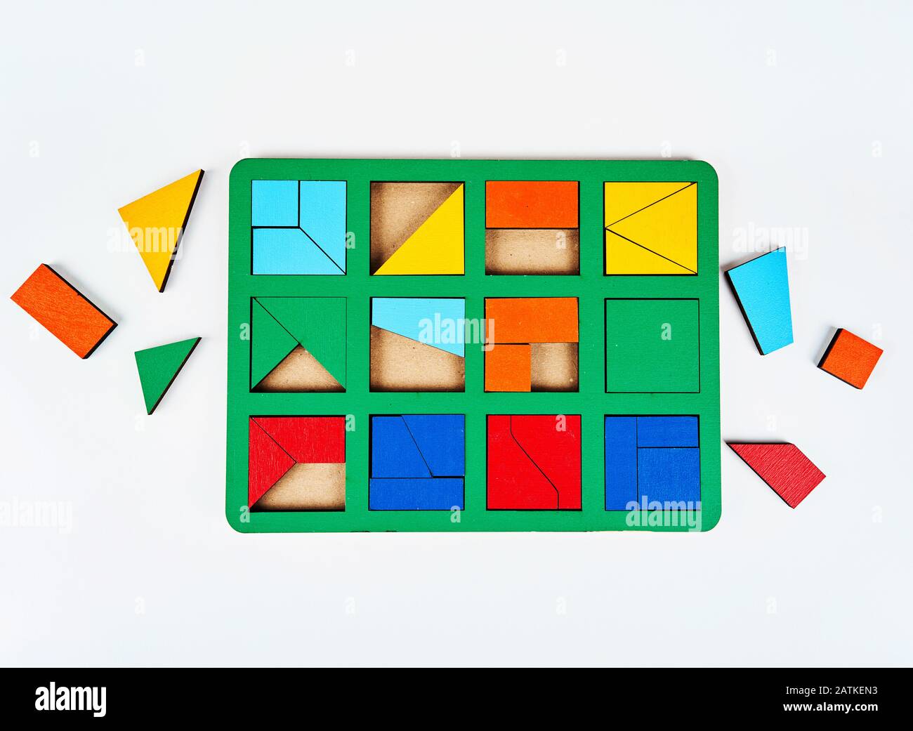 bright children's puzzles on a white background Stock Photo - Alamy