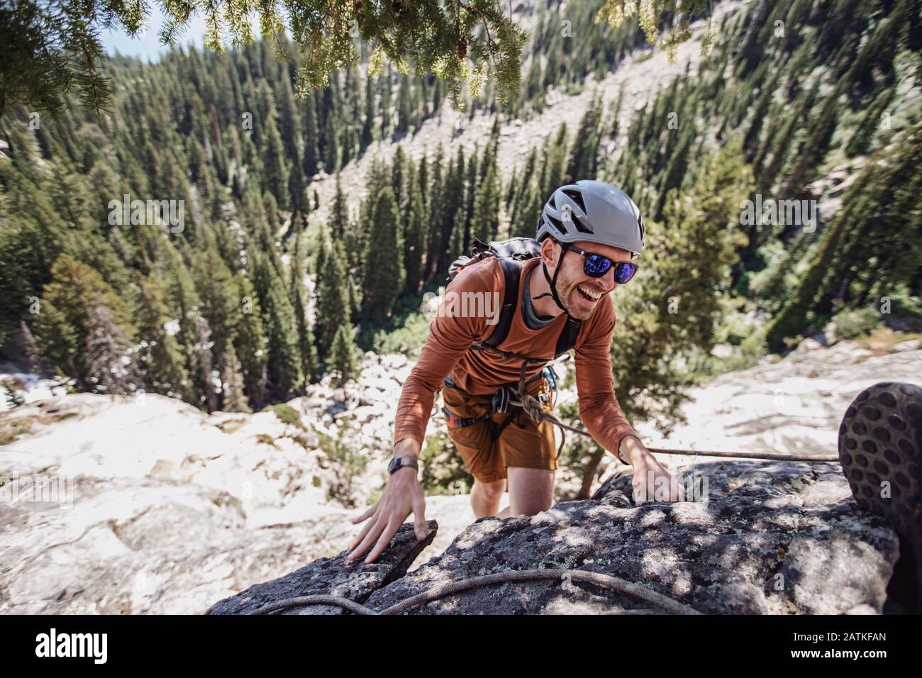 Climbing A Rope High Resolution Stock Photography and Images - Alamy