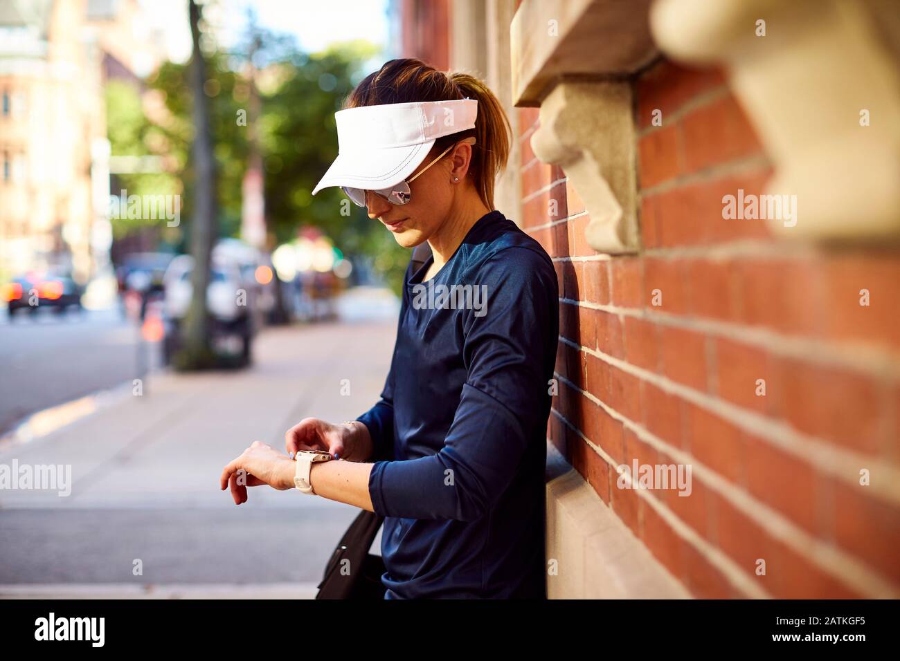 Lady checking watch hi-res stock photography and images - Alamy