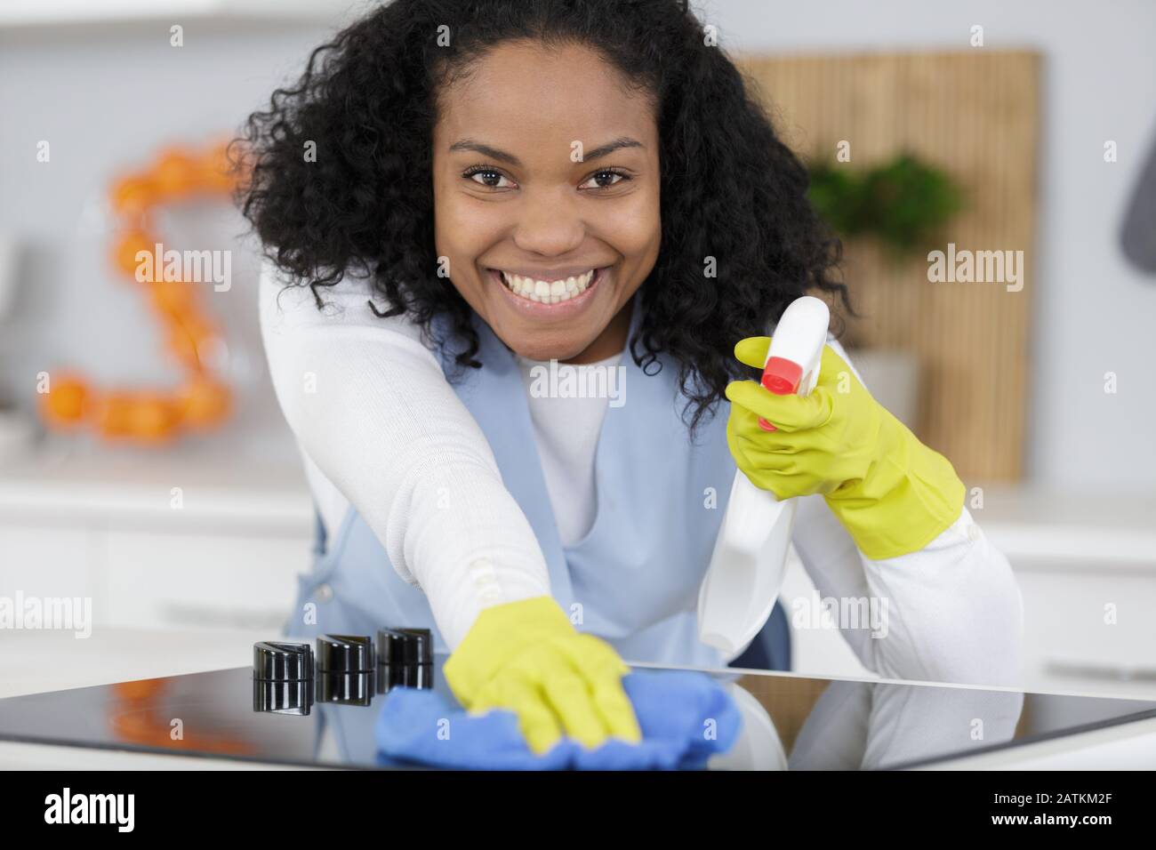 Maid cleans up kitchen hi-res stock photography and images - Alamy