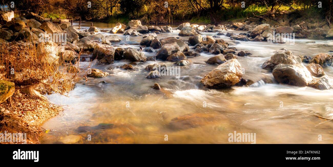 Cascade of water flowing through the rapids in the river Stock Photo ...