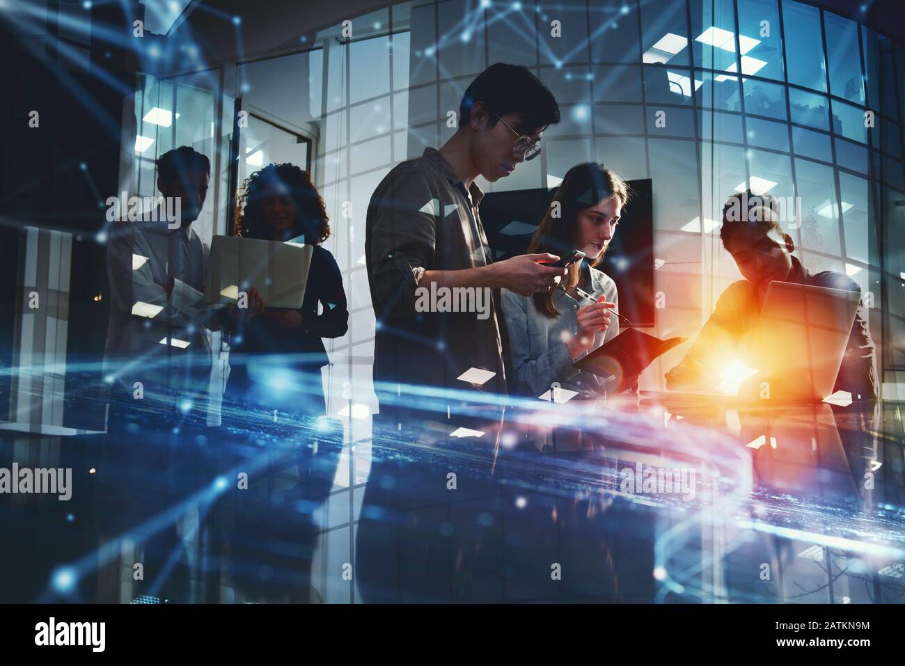 Businessmen that work together in office with network connection effect ...