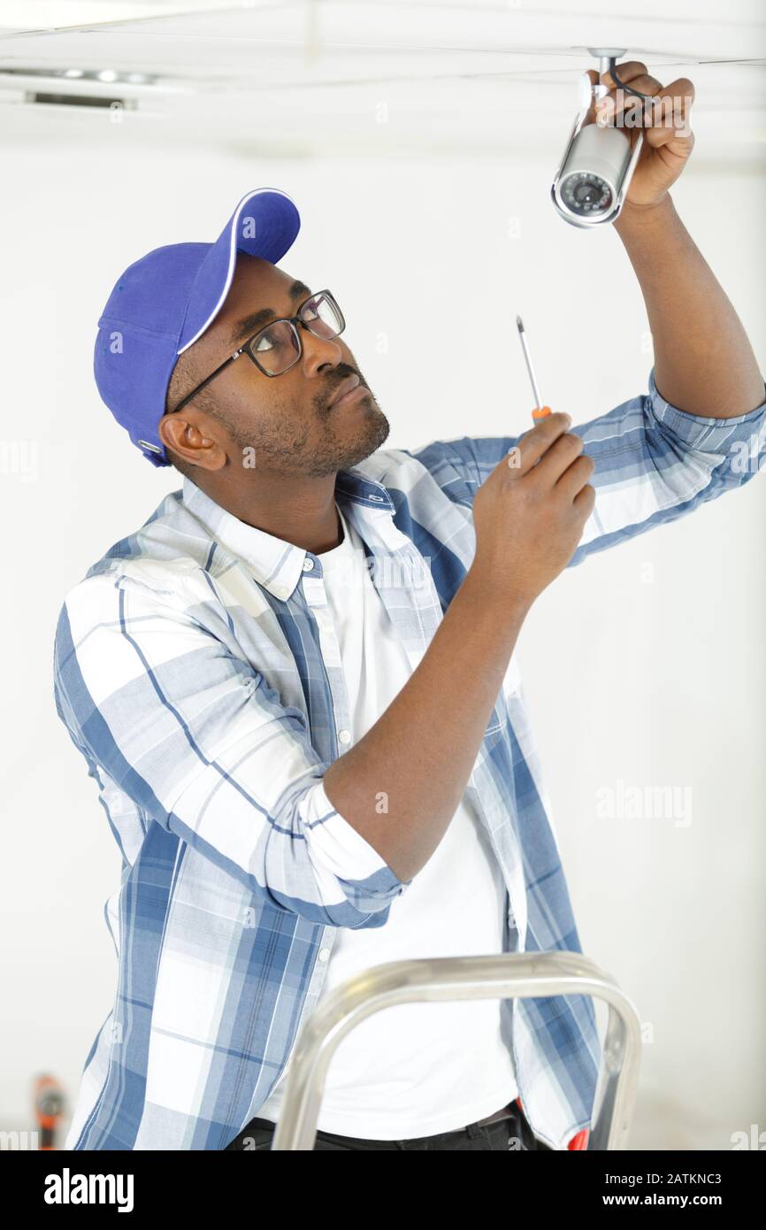 Installing a remote camera hi-res stock photography and images - Alamy