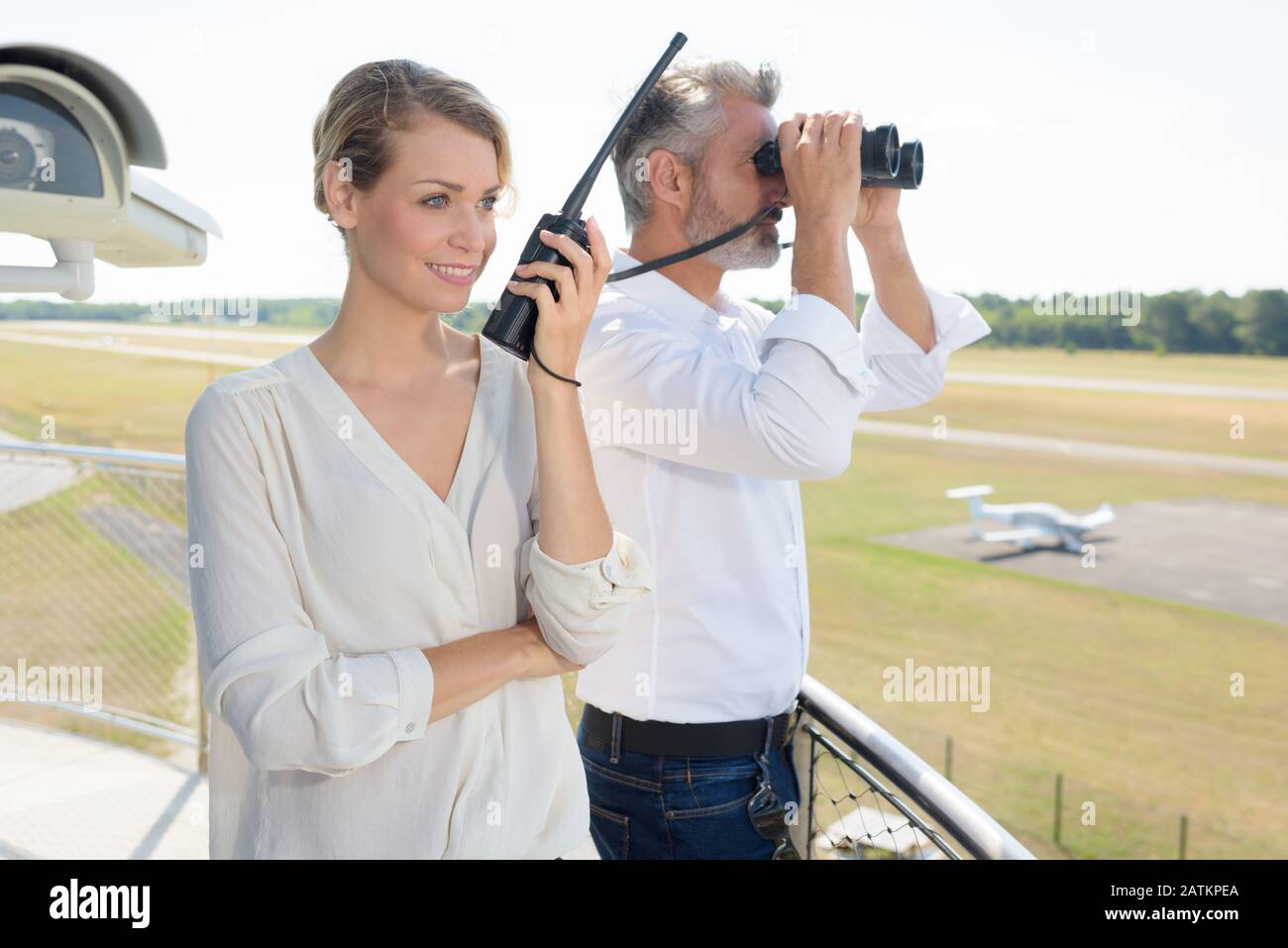 the aircontrol communication tower workers Stock Photo - Alamy