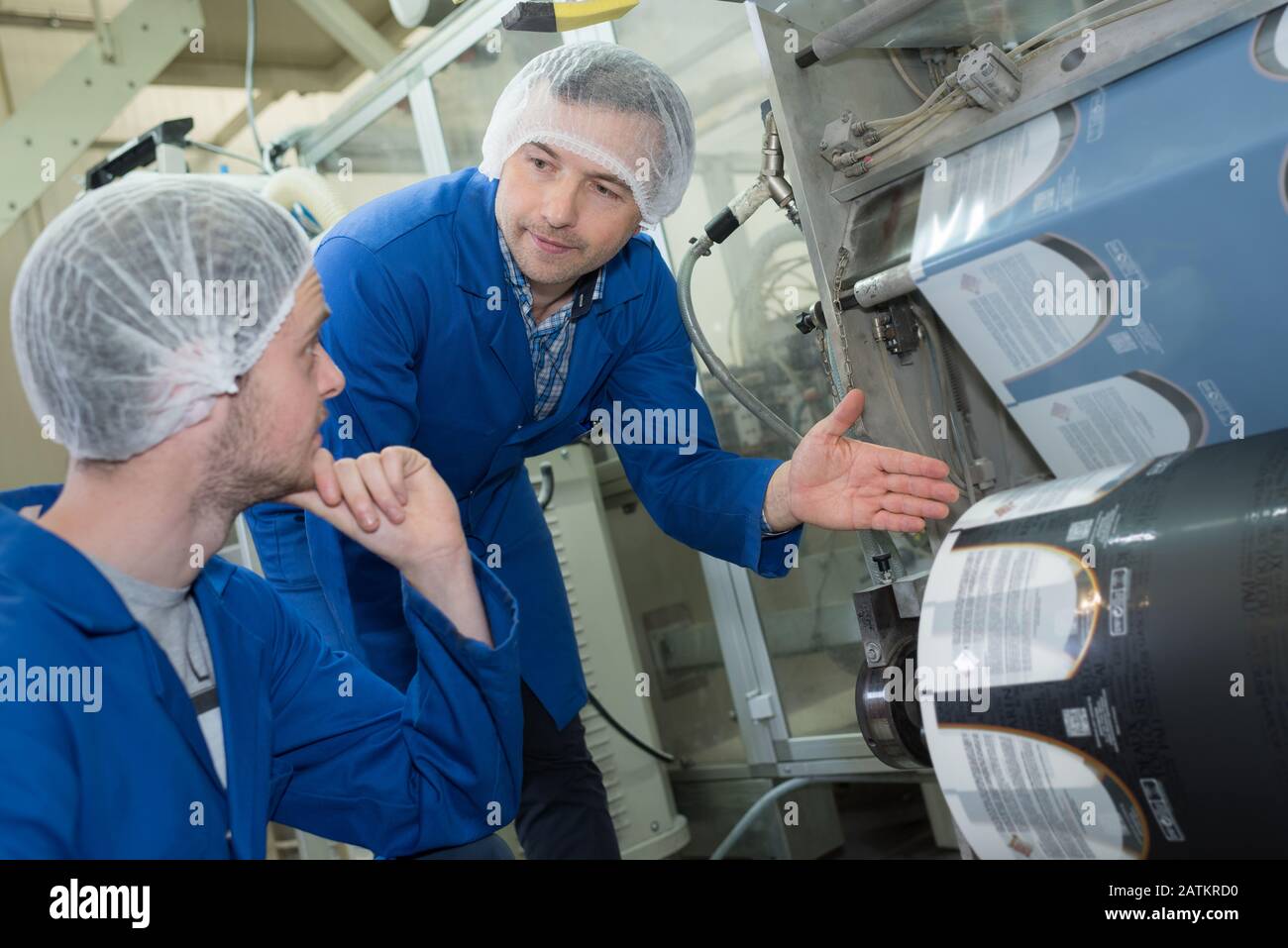 Printing press and workers hi-res stock photography and images - Alamy