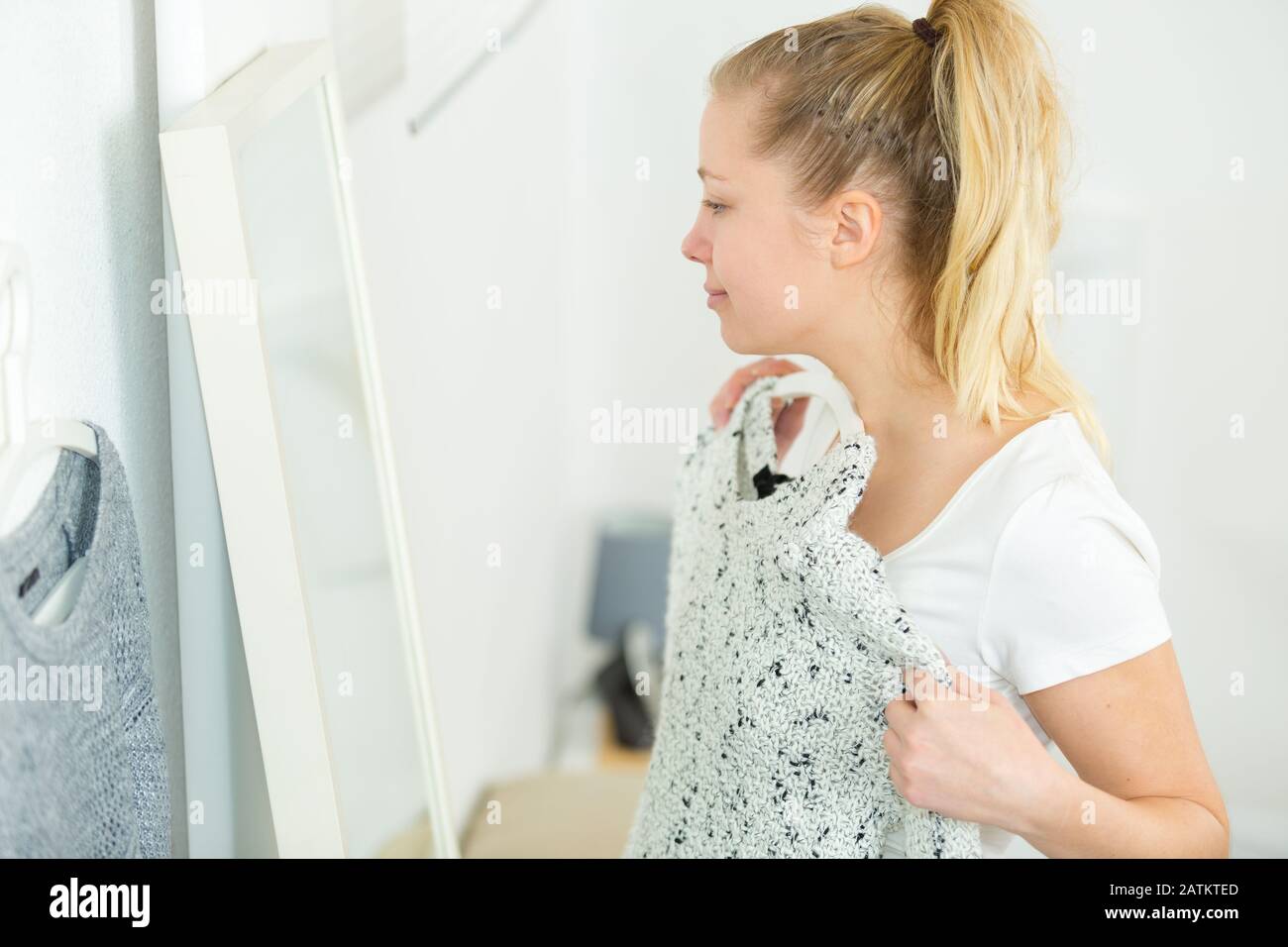 portrait of customer in fashion store Stock Photo - Alamy