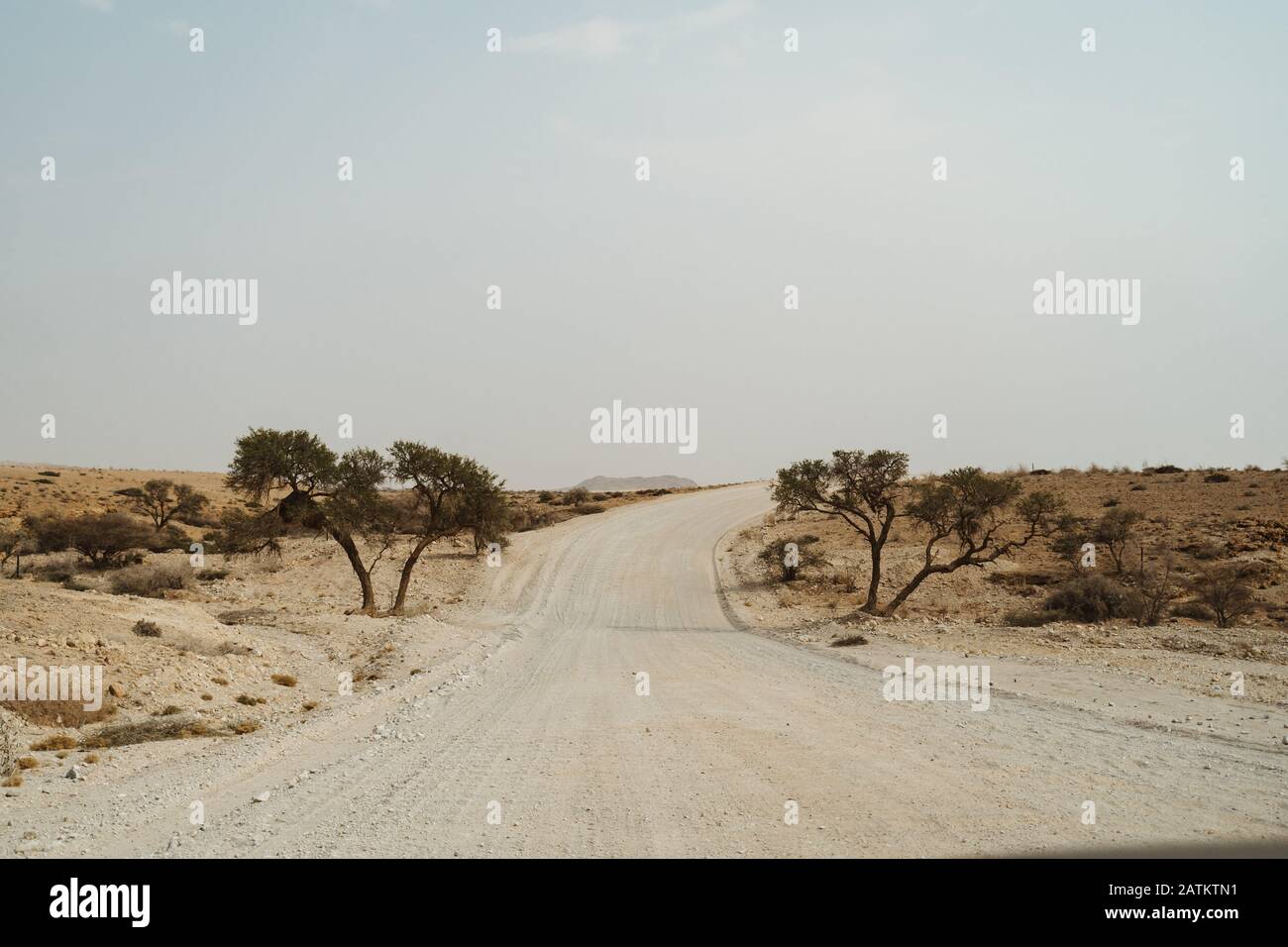 Dusty 4 x 4 car Road Trip on lonely road Stock Photo - Alamy