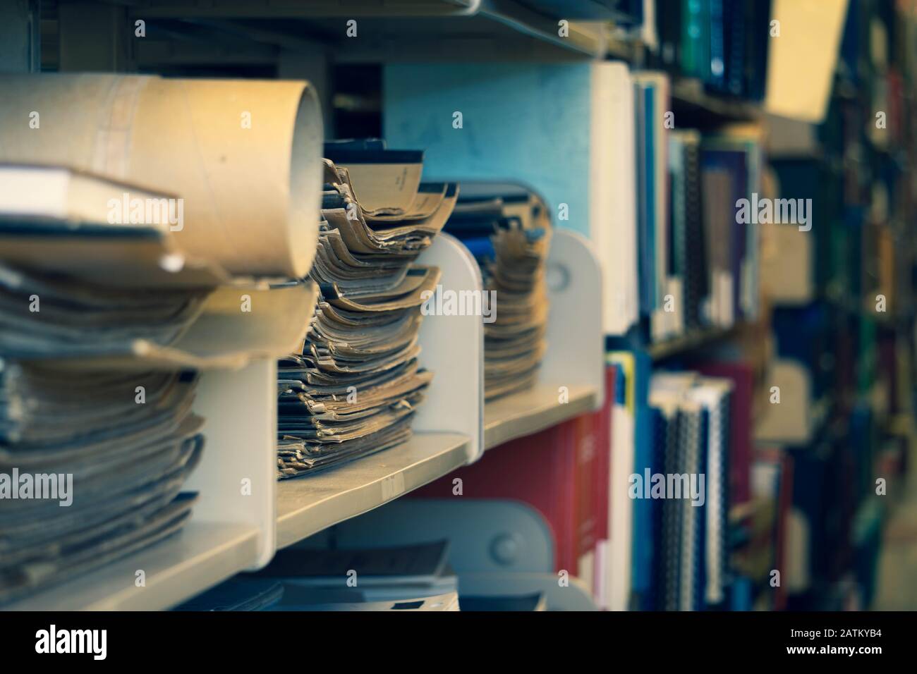 a stack of magazines on a library shelf Stock Photo - Alamy