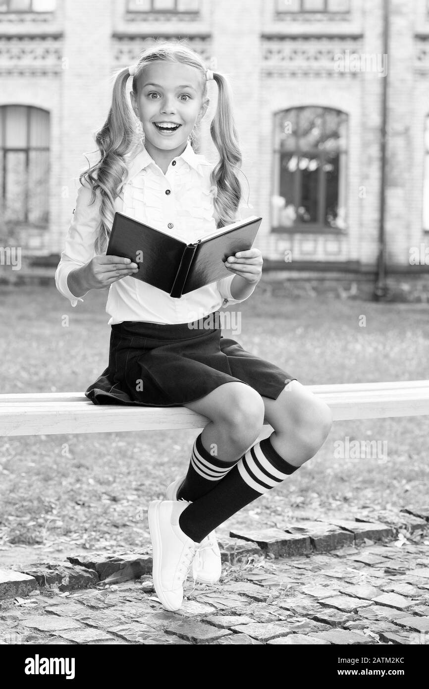 Check it ou. old school. back to school. small happy girl study ...