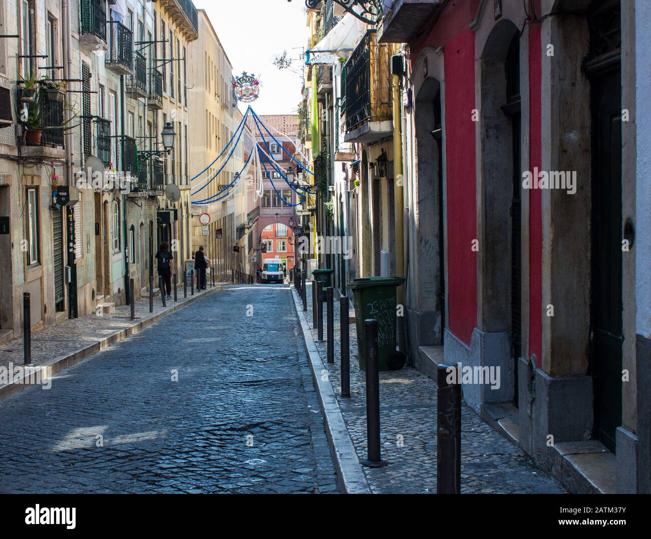 Perspective view of narrow European city street Stock Photo - Alamy