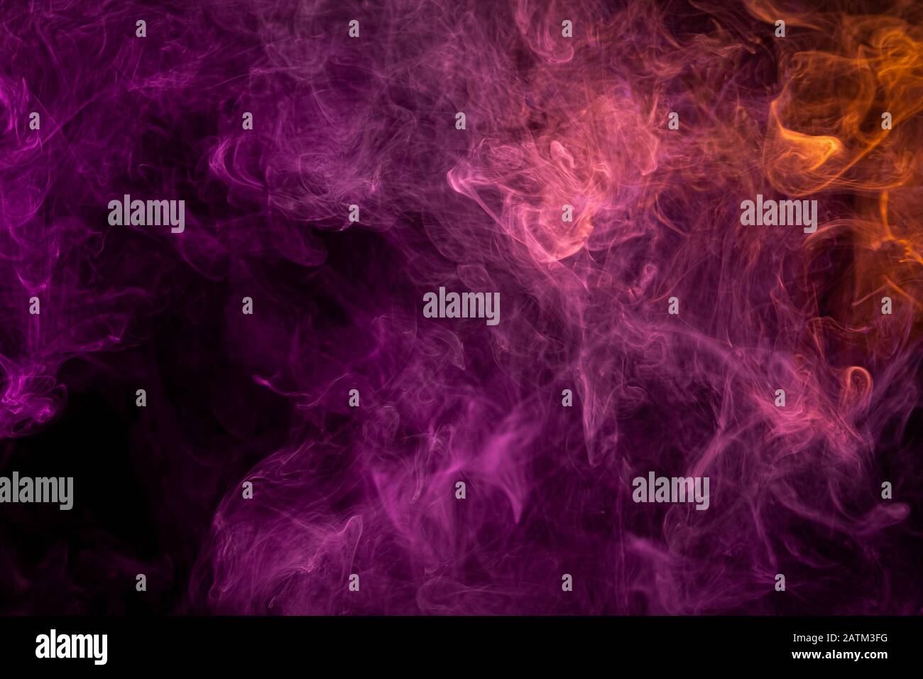 Colorful pink and red smoke on a black isolated background. Background ...