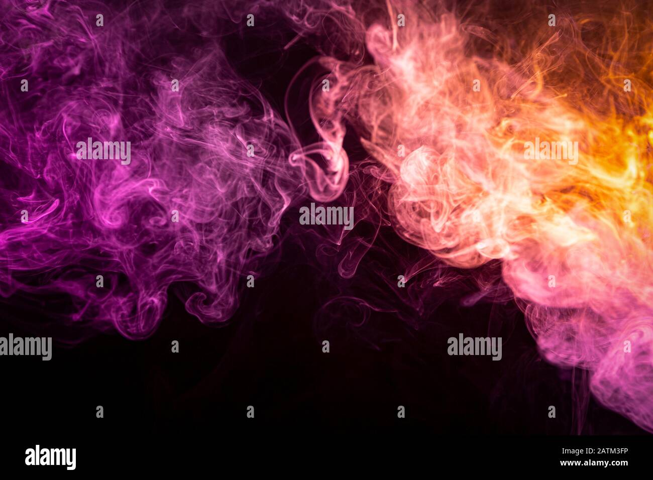 Colorful pink and red smoke on a black isolated background. Background ...