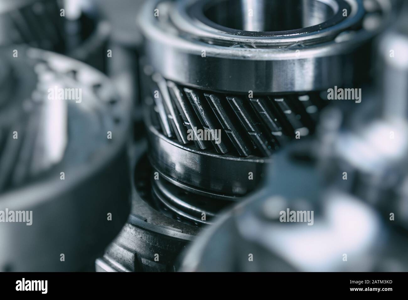 Close-up of a car gearbox. Metallic shiny gears for planetary gearshift ...