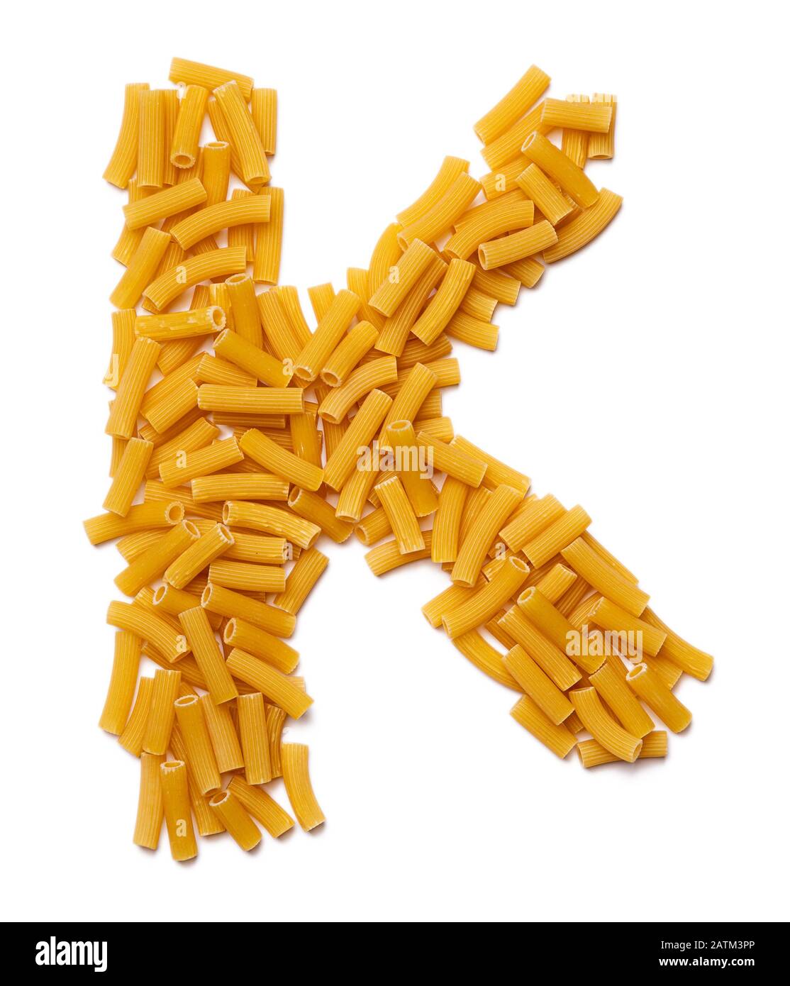 Letter K of the English alphabet from dry pasta on a white isolated ...