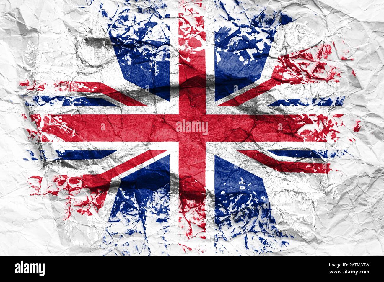 The national flag of the United Kingdom is painted on crumpled paper ...