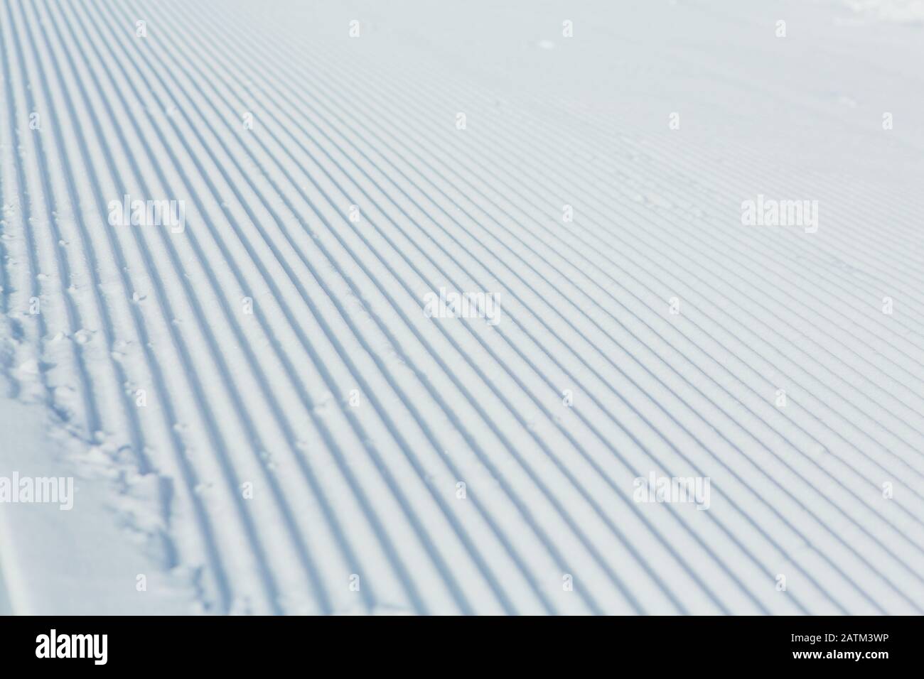 Snow lines made from a snow machine Stock Photo - Alamy