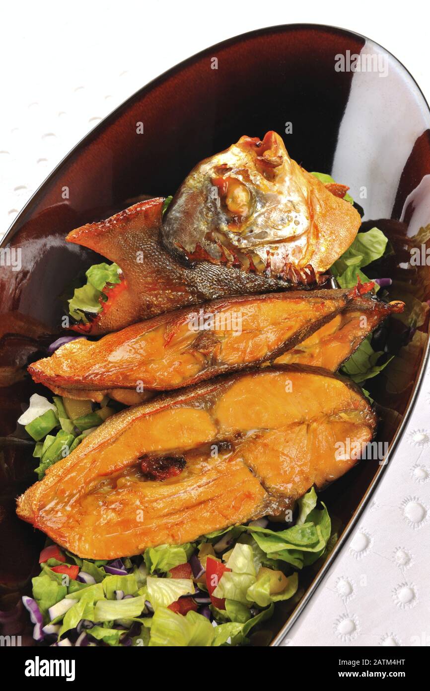 Food portrait of steamed sliced fish Stock Photo - Alamy