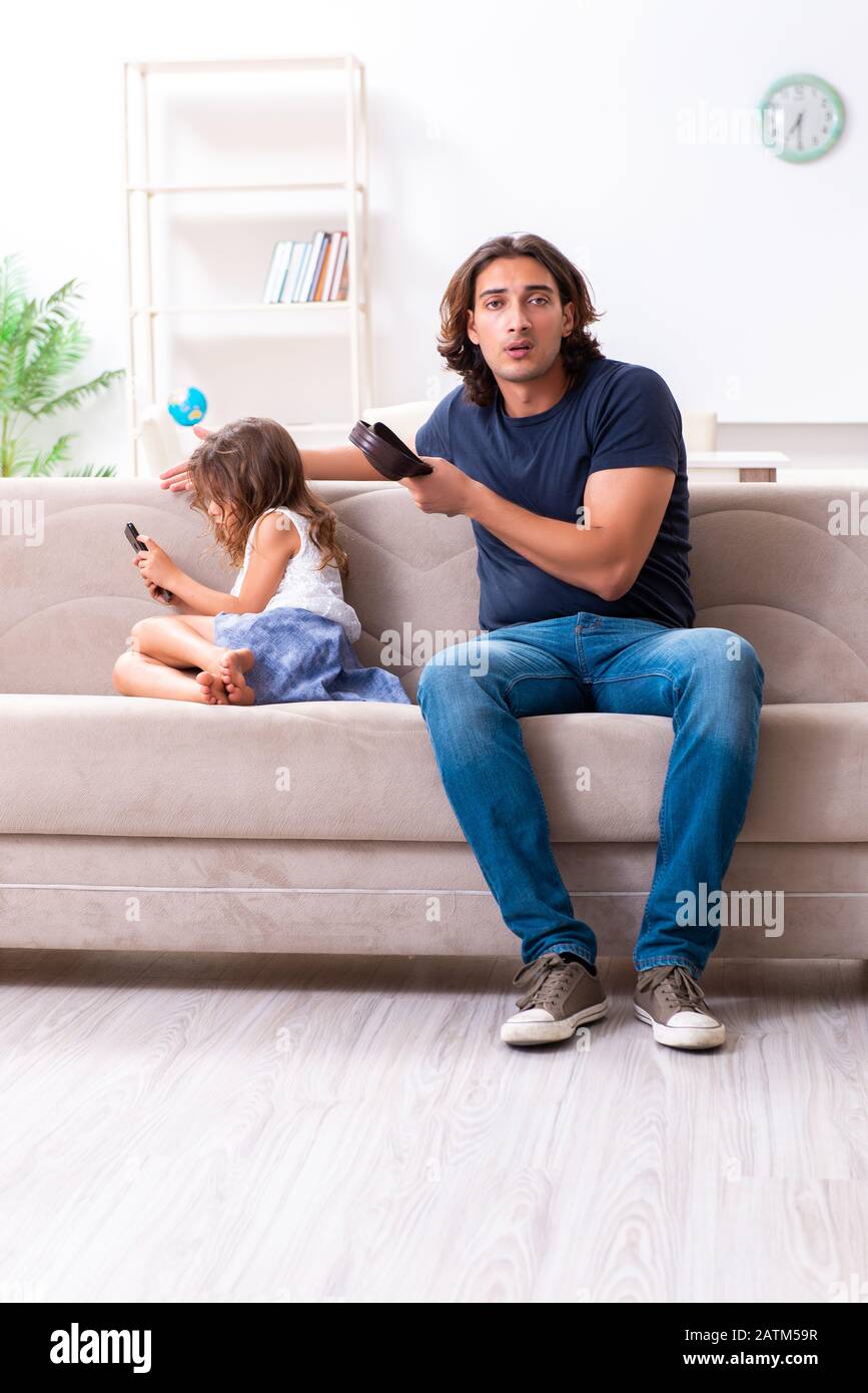 The angry father punishing his daughter Stock Photo - Alamy