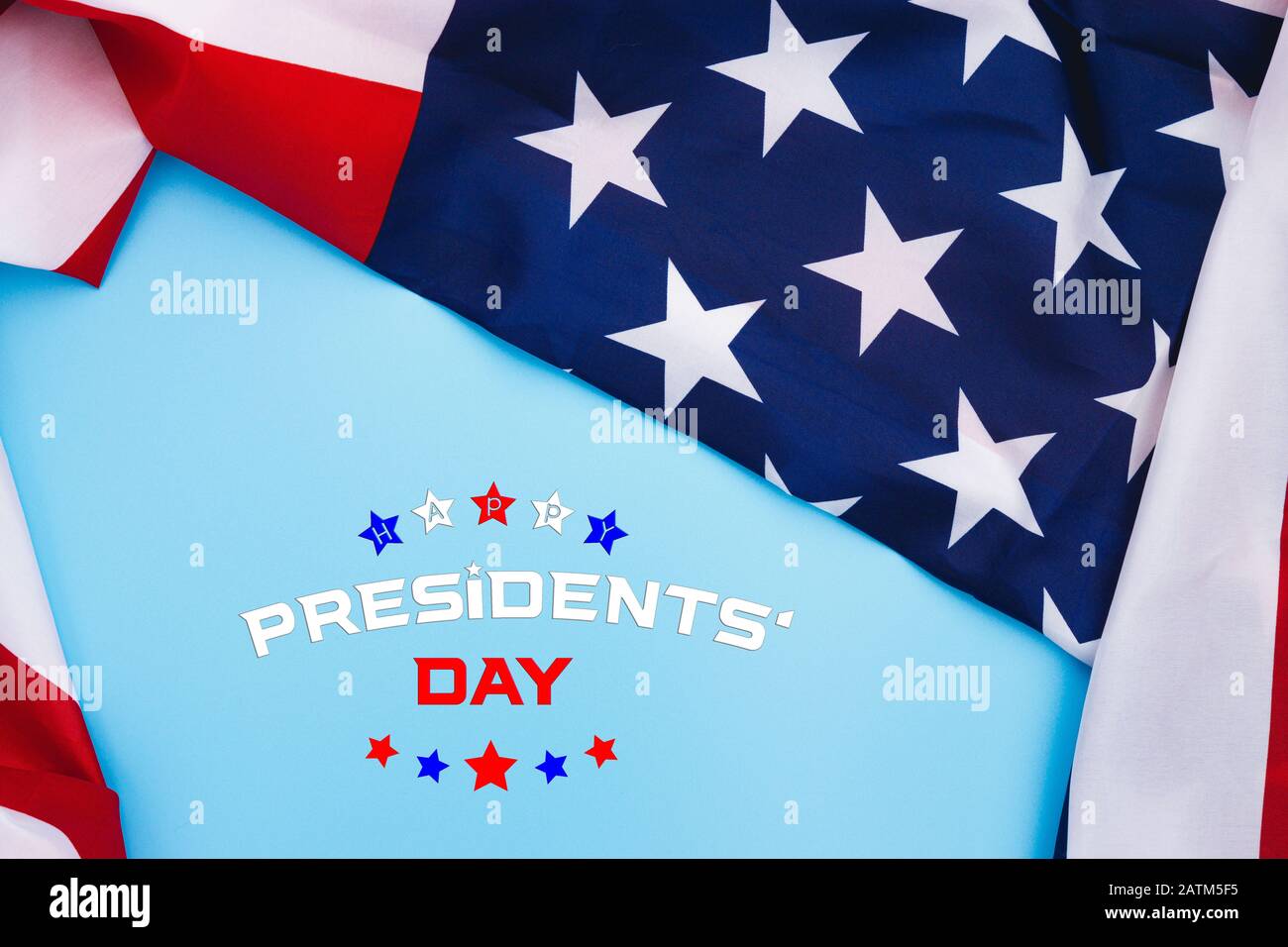 Happy Presidents' Day typography over blue background with US American ...