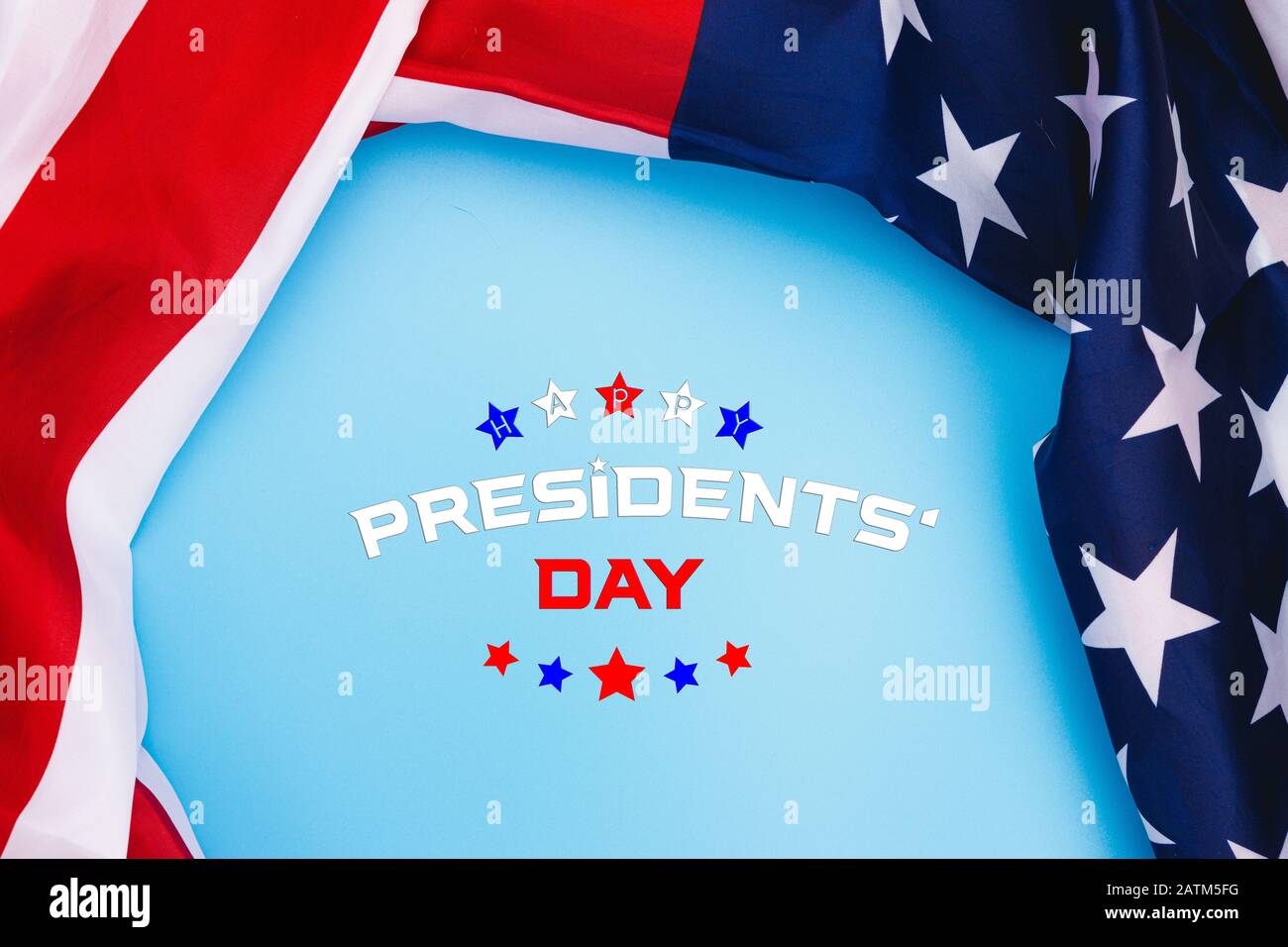 Happy Presidents' Day typography over blue background with US American ...