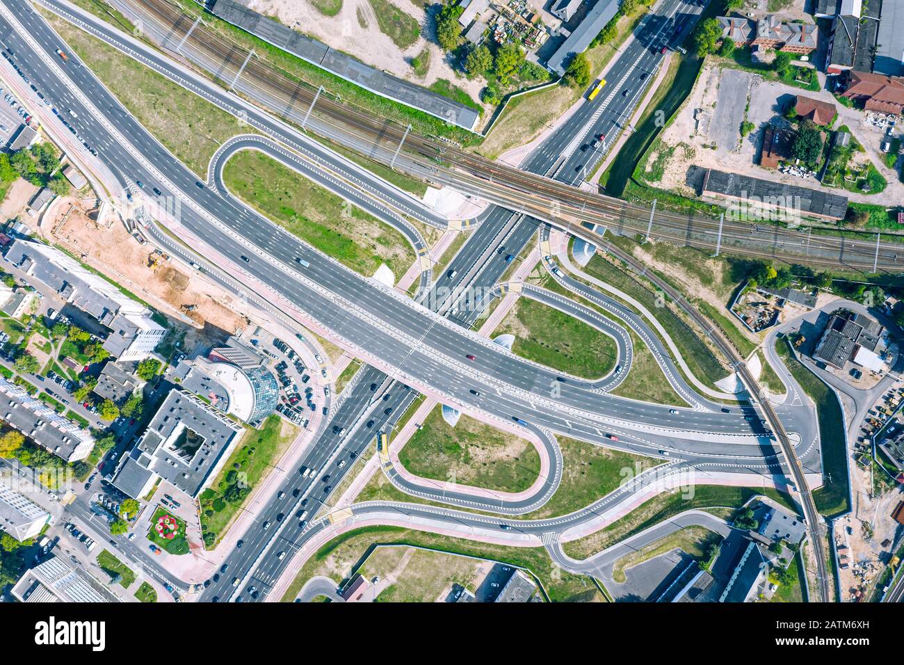 aerial top down view on freeway intersection at industrial district ...