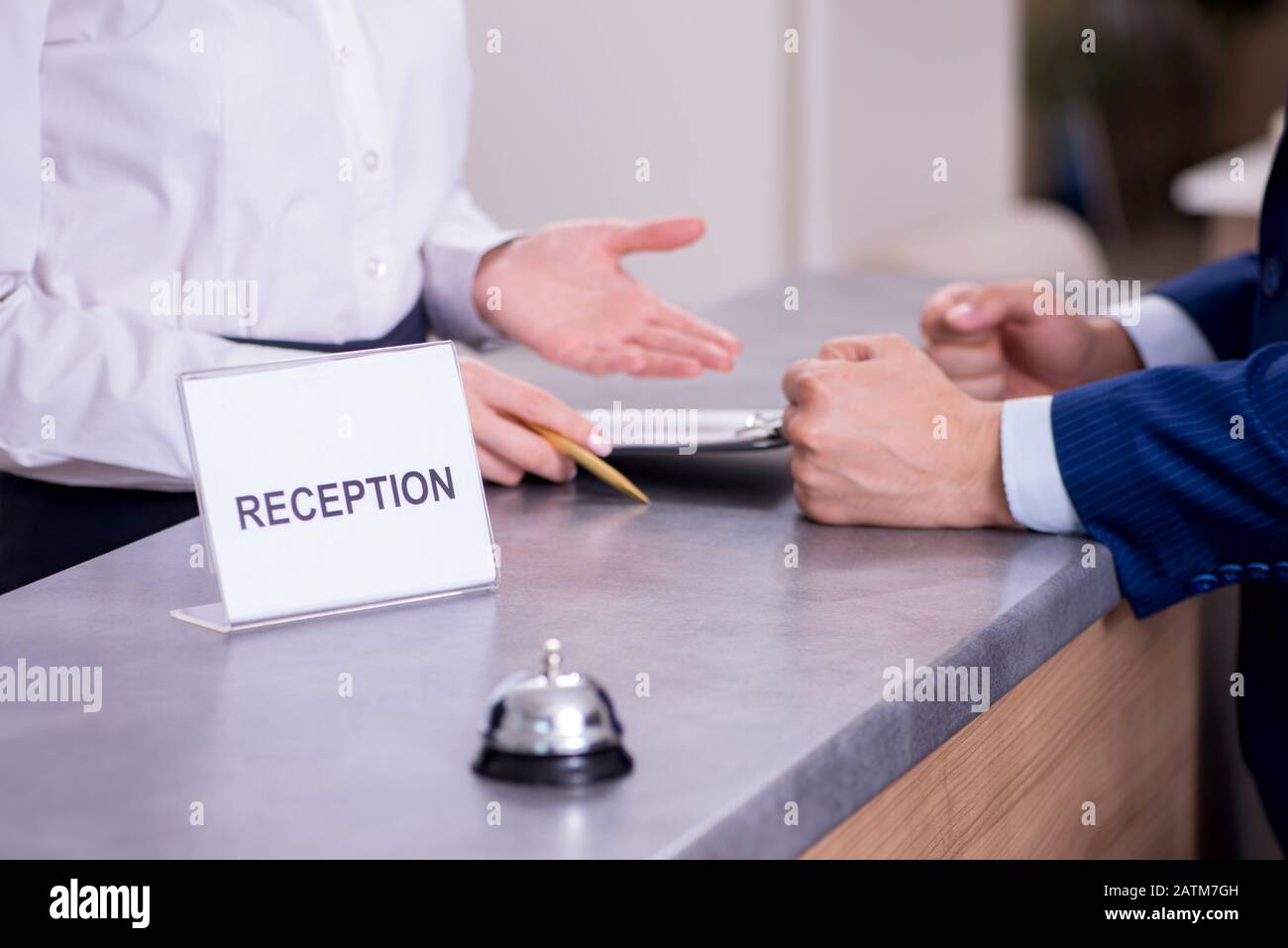 The hotel reception bell at the counter Stock Photo - Alamy