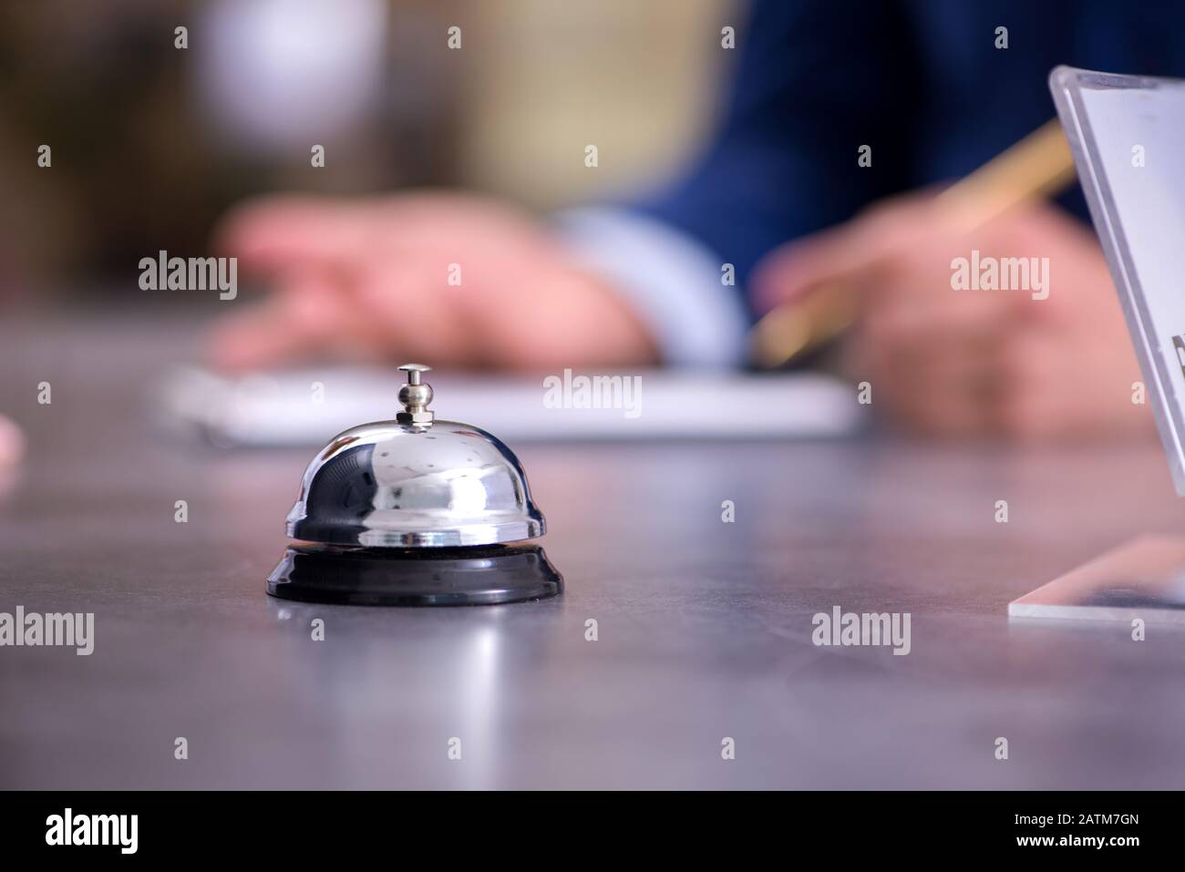 The hotel reception bell at the counter Stock Photo - Alamy