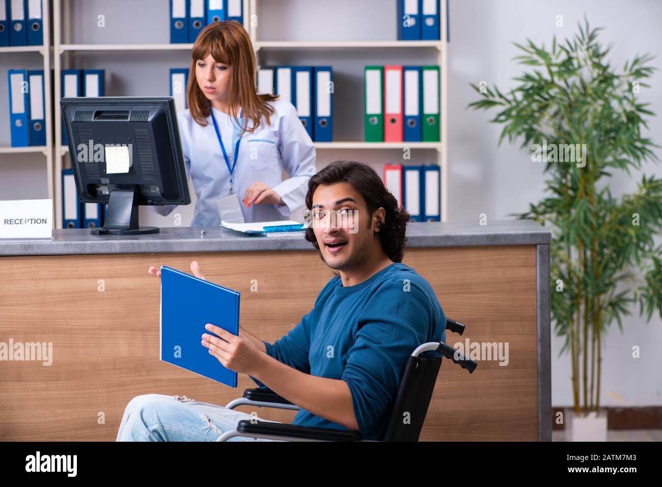 The young patient at the reception in the hospital Stock Photo - Alamy