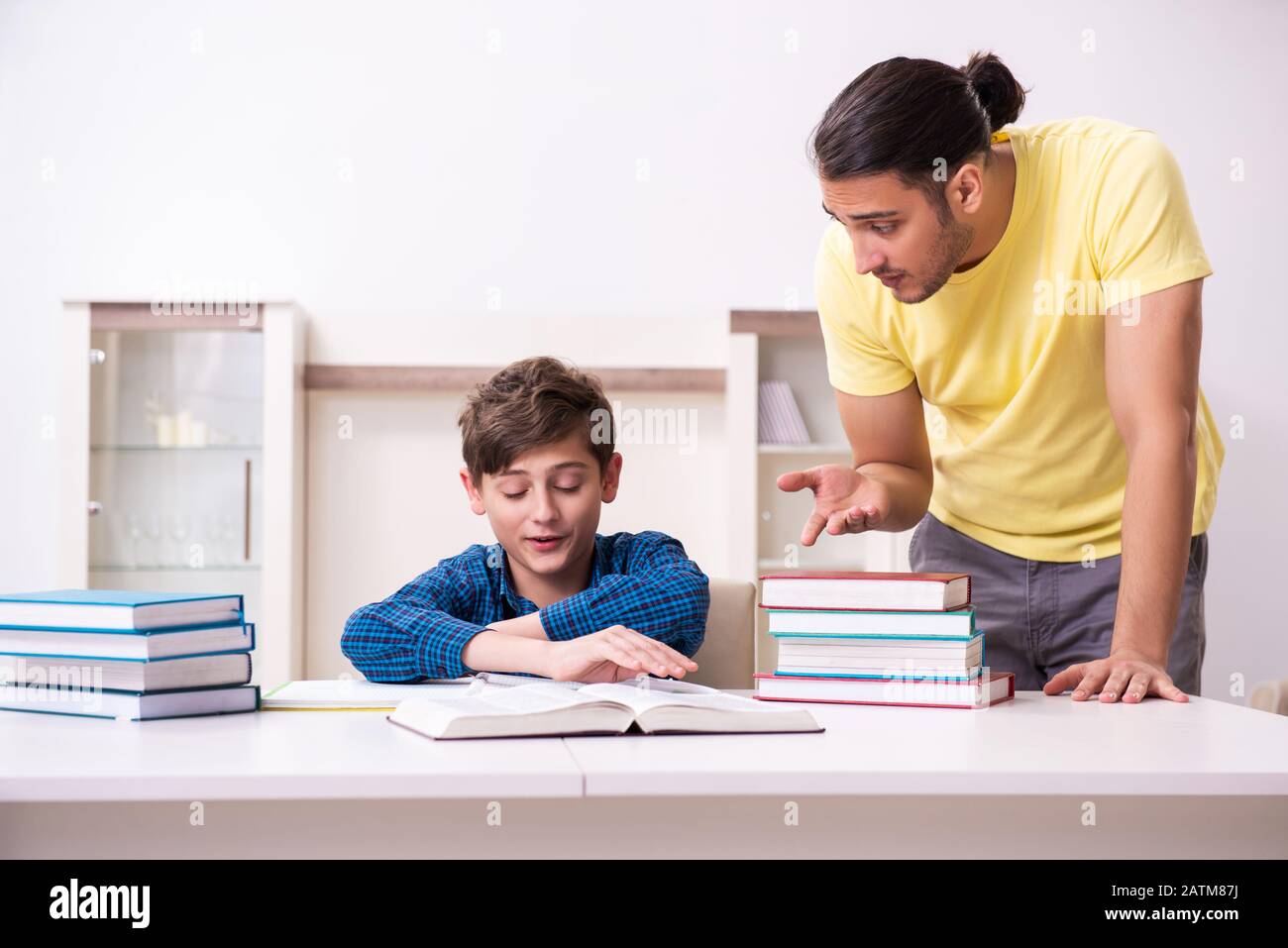 The father helping his son to prepare for school Stock Photo - Alamy