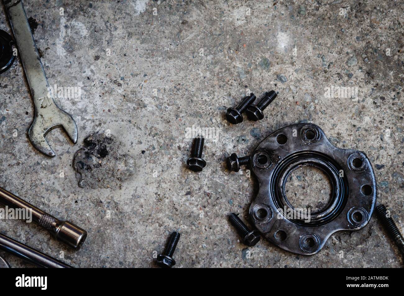Motorcycle repair tools on the ground Stock Photo - Alamy