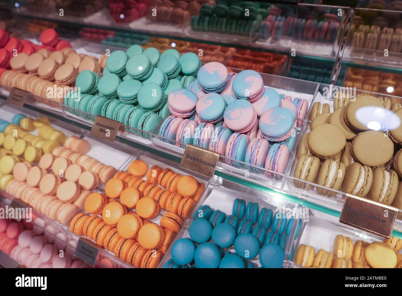 multi color Macaroon display for sale at local store Stock Photo - Alamy