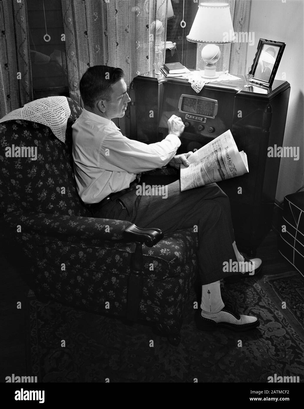 Old man tuning radio hi-res stock photography and images - Alamy