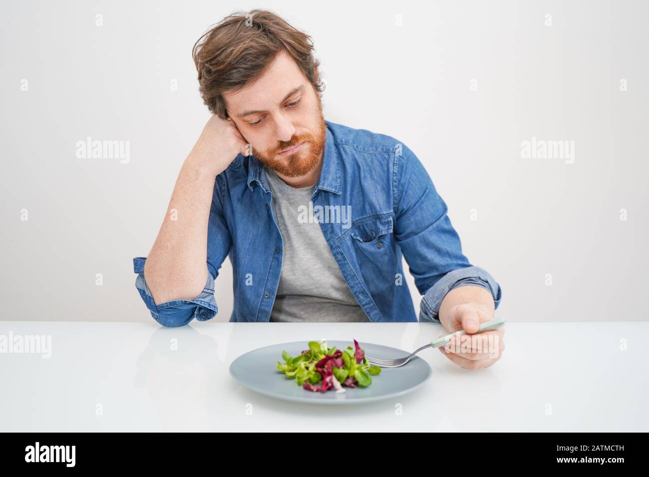 Starving man hi-res stock photography and images - Alamy