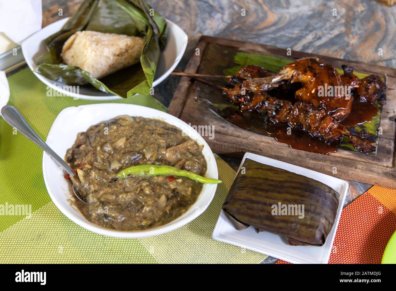 Filipino food Laing , banana leaf rice and barbeque, Philippines Stock ...