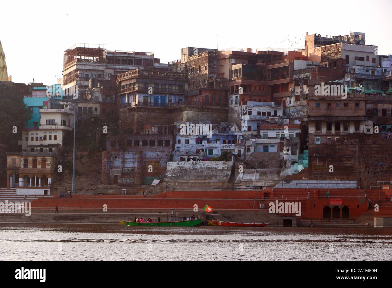 Long view of popular Assi Ghat with several pilgrims, that stands at ...