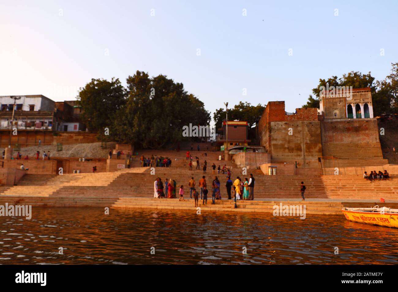 Long view of popular Assi Ghat with several pilgrims, that stands at ...