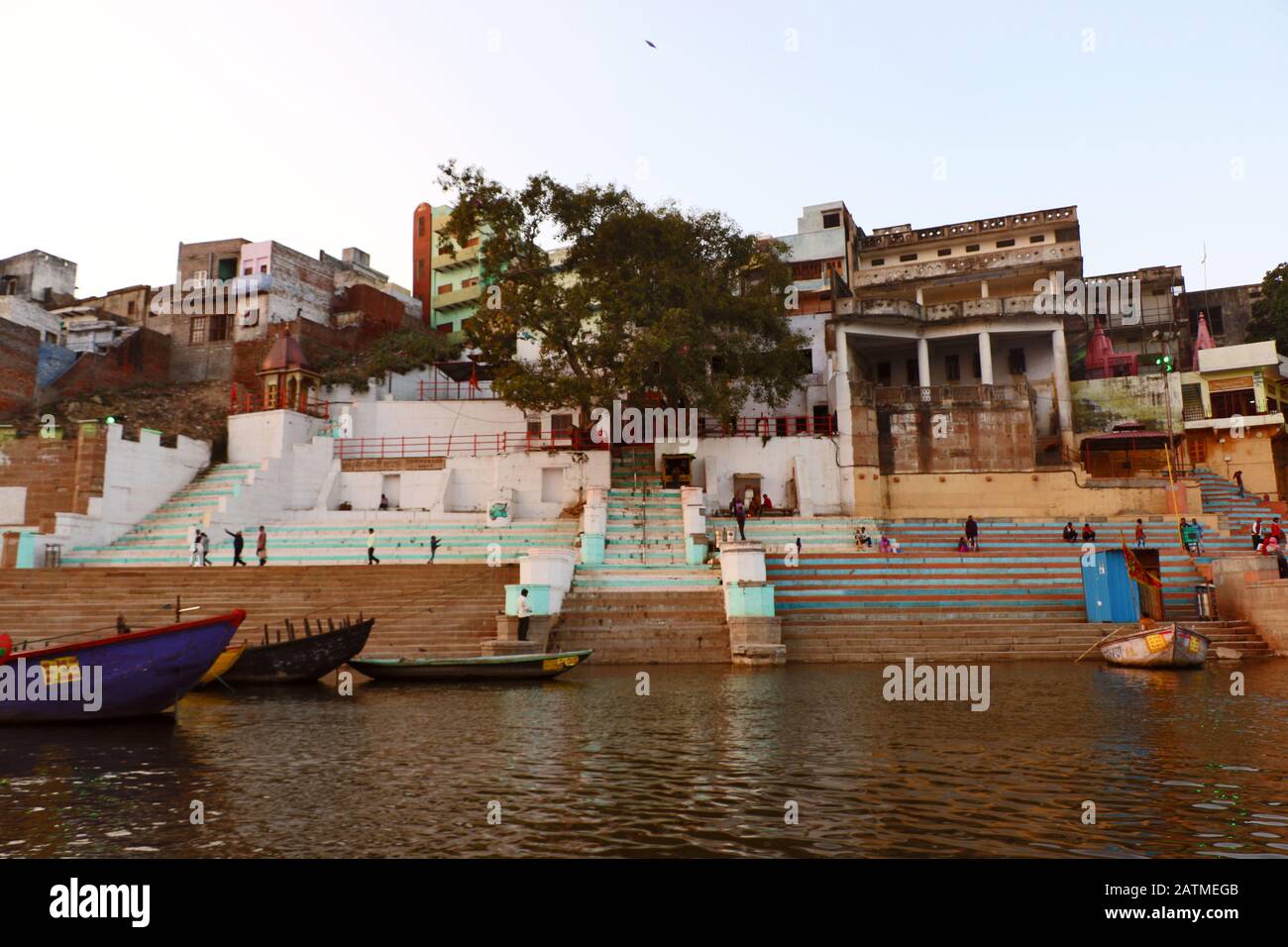view of popular Assi Ghat with several pilgrims, that stands at the ...