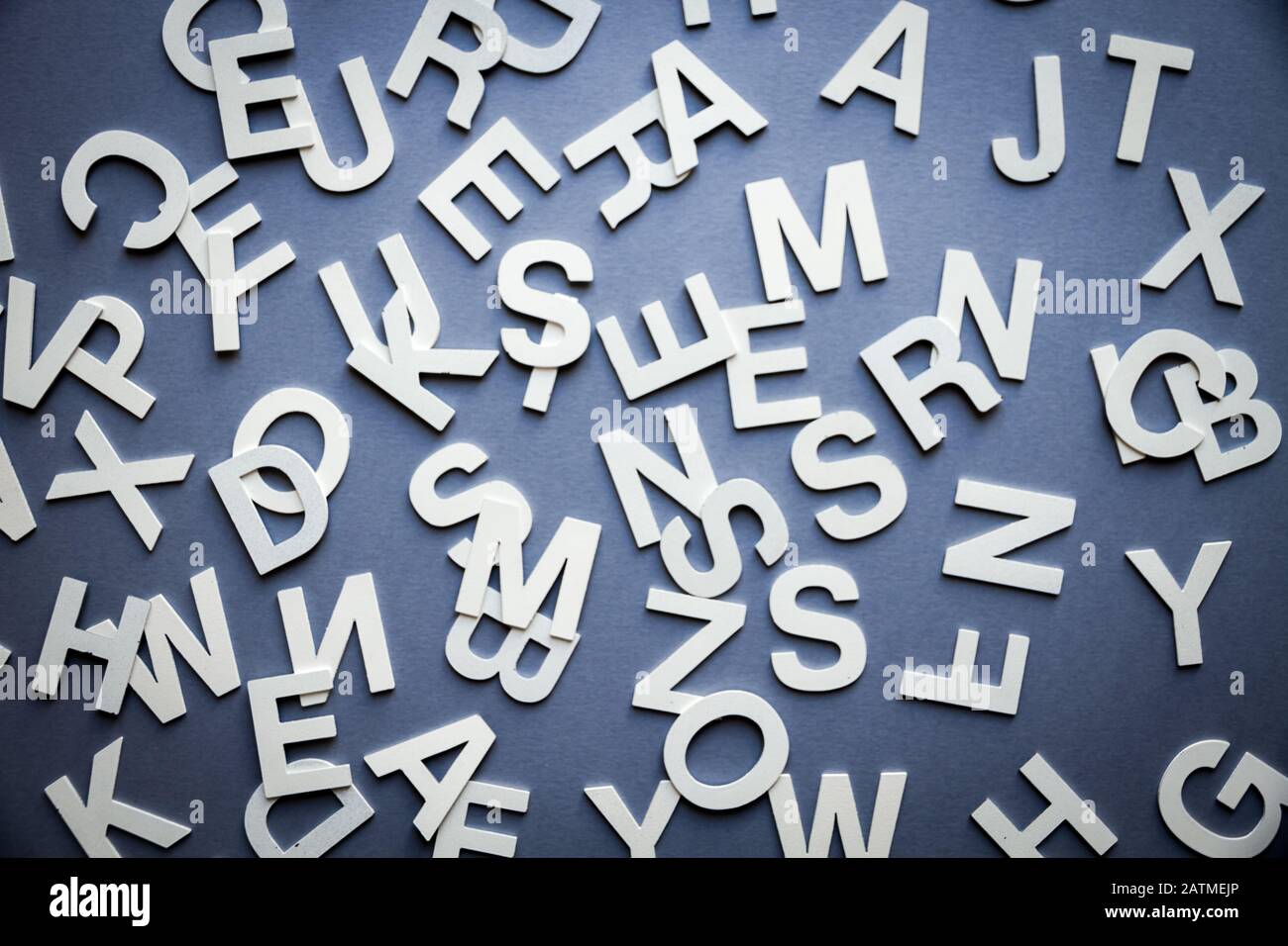 Mixed solid letters pile top view photo. Education background concept ...