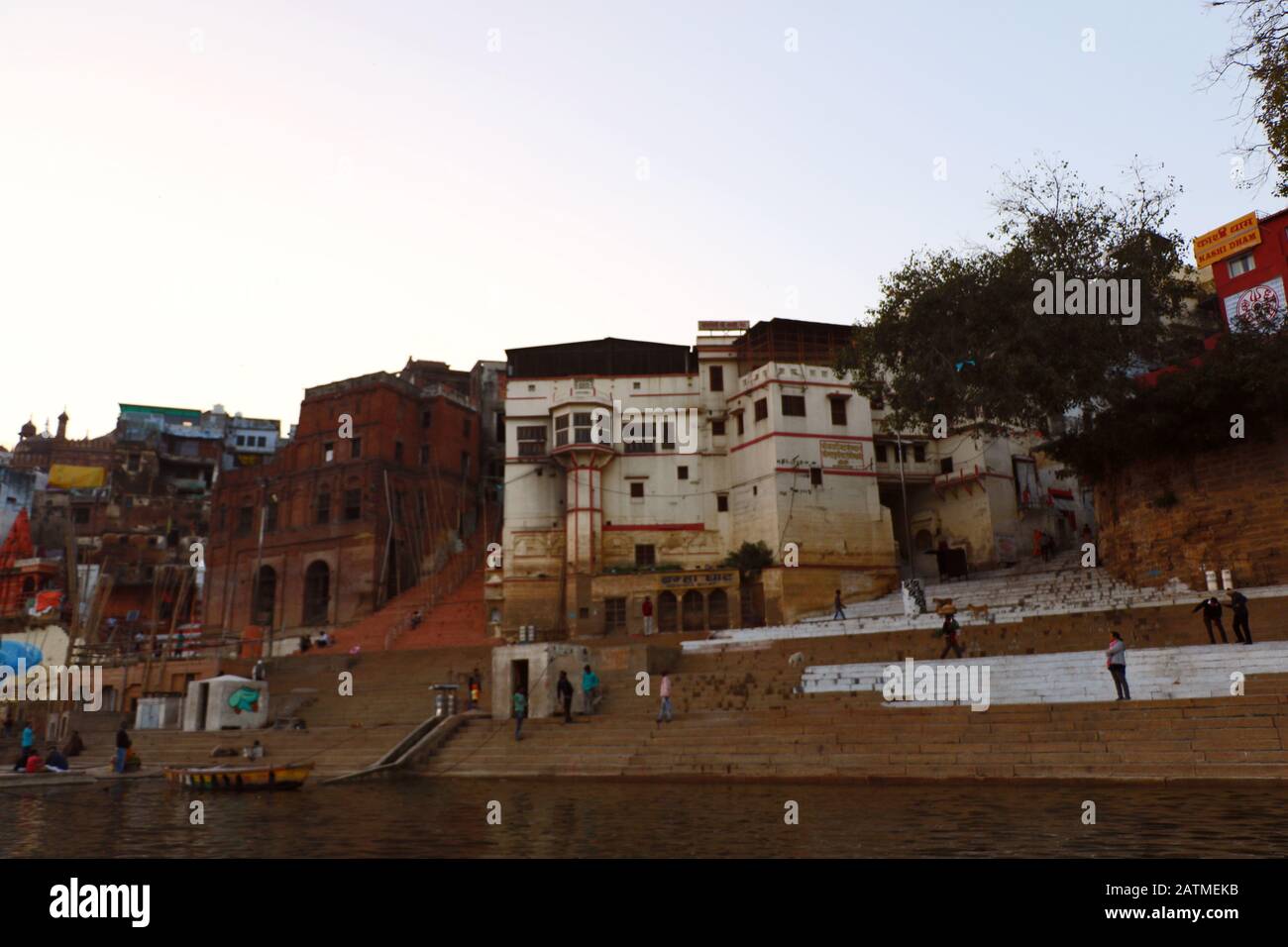 view of popular Assi Ghat with several pilgrims, that stands at the ...