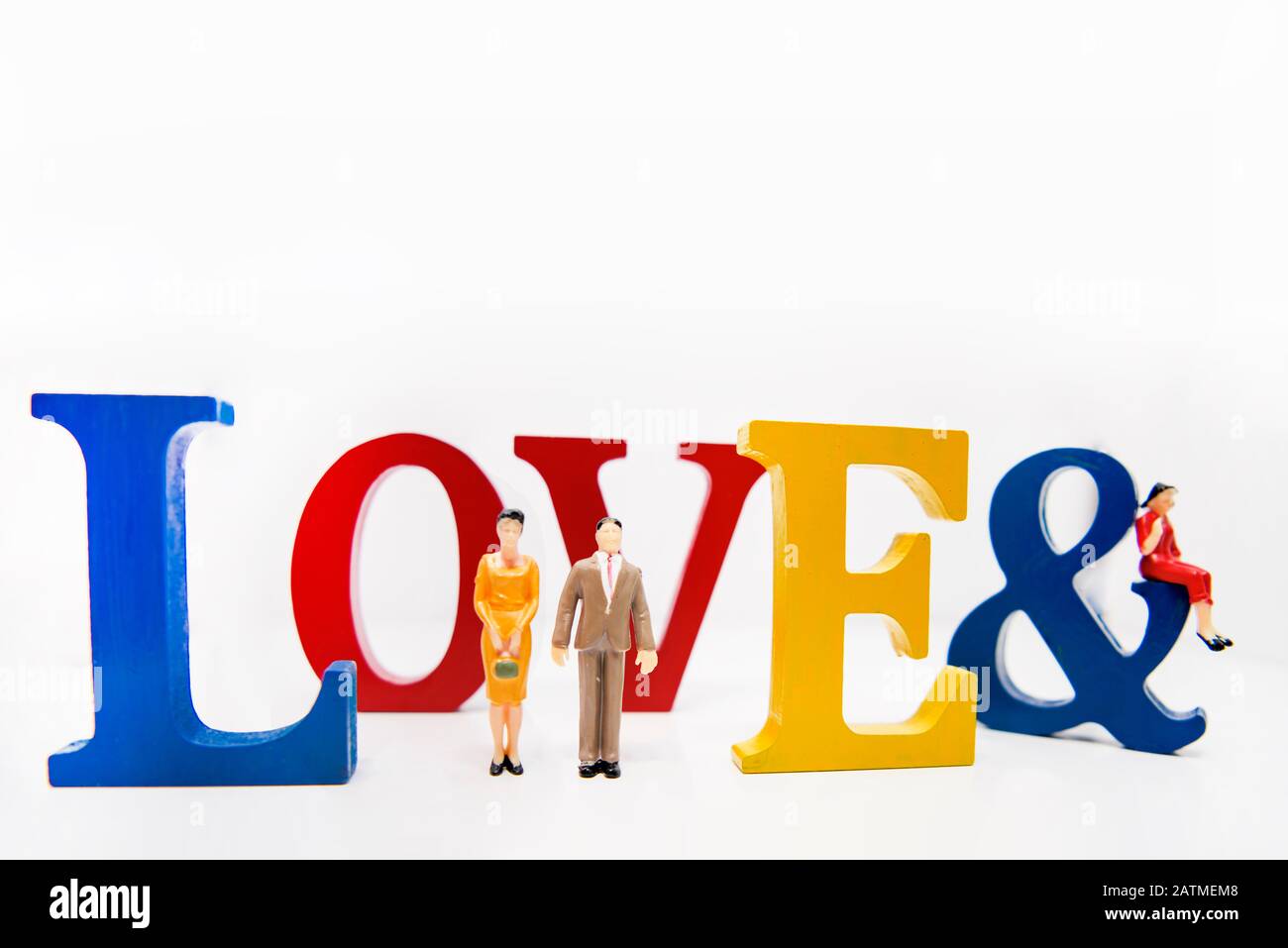 Love triangle. Abstract photo of love and lovers. Big wooden letters ...