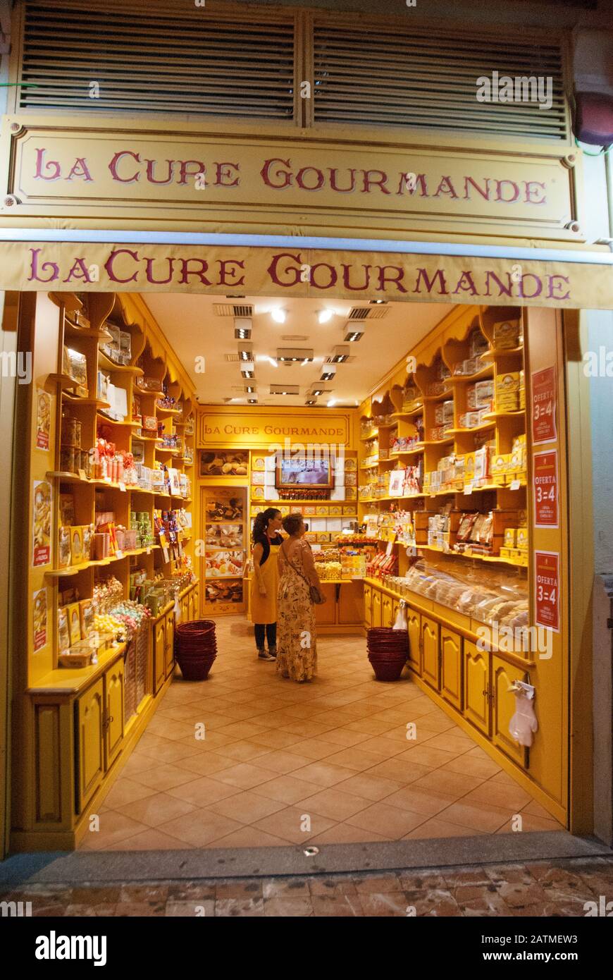La Cure Gourmande Shop at night Valencia Spain Stock Photo - Alamy