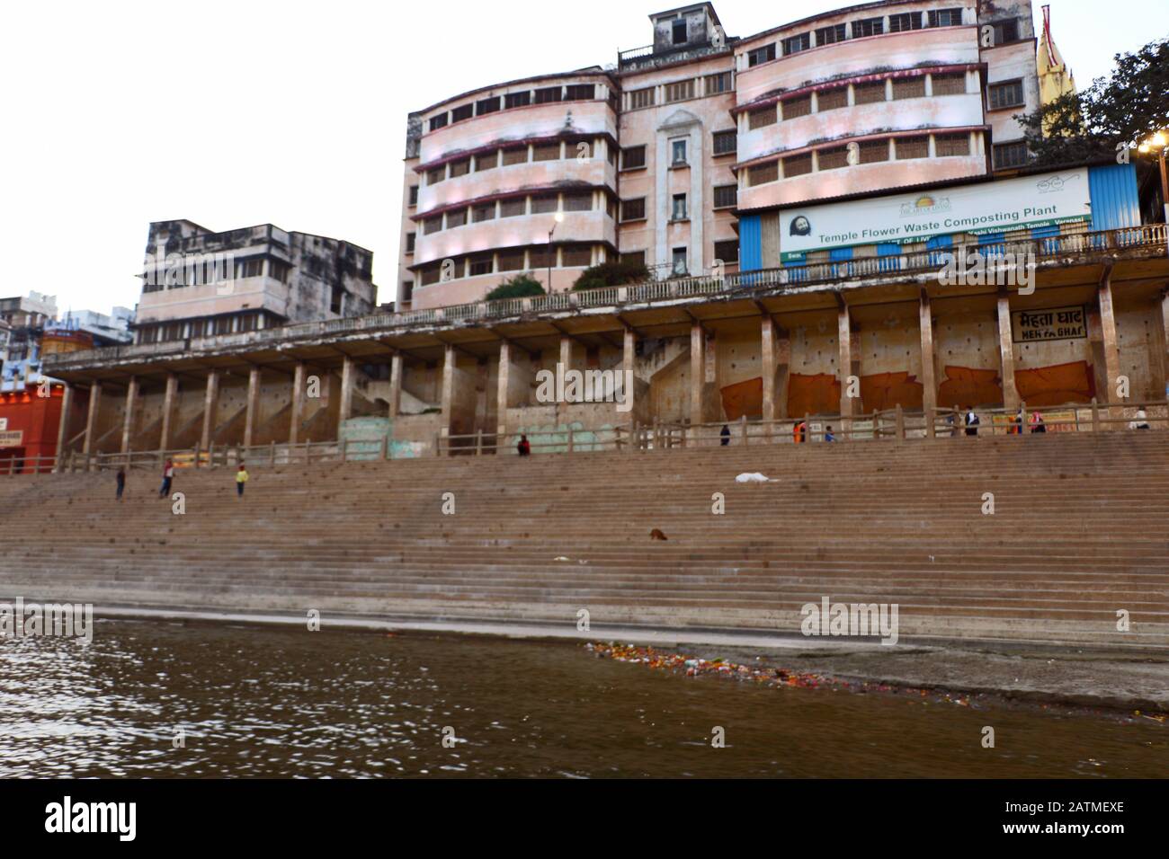 view of popular Assi Ghat with several pilgrims, that stands at the ...