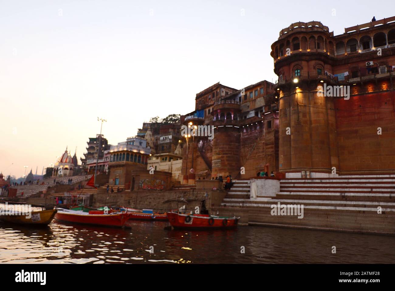 view of popular Assi Ghat with several pilgrims, that stands at the ...