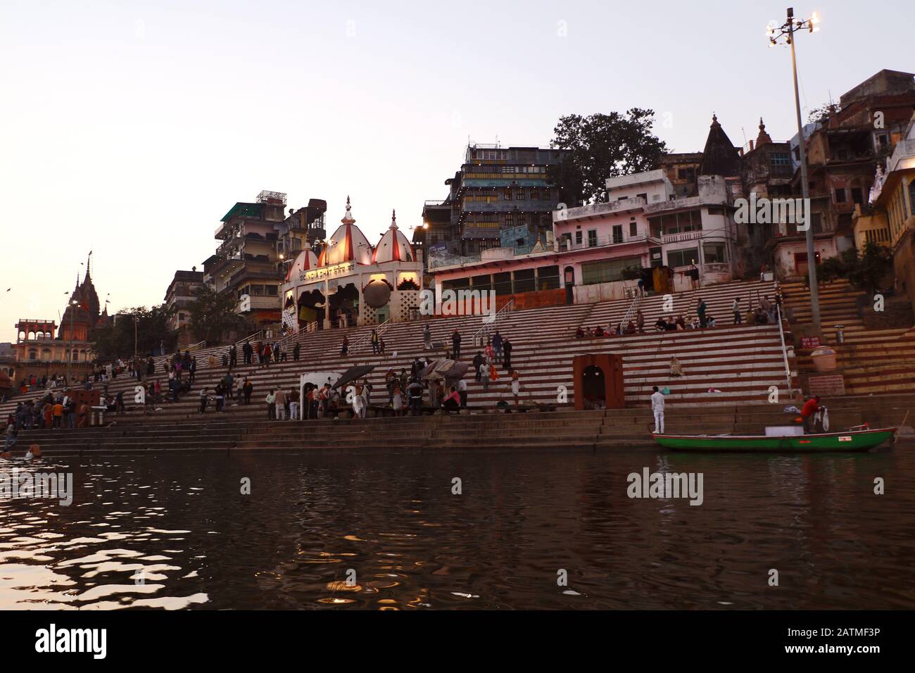 view of popular Assi Ghat with several pilgrims, that stands at the ...