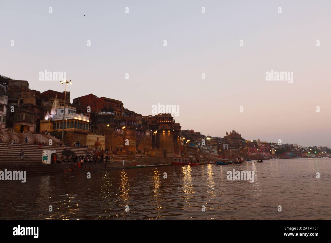 view of popular Assi Ghat with several pilgrims, that stands at the ...