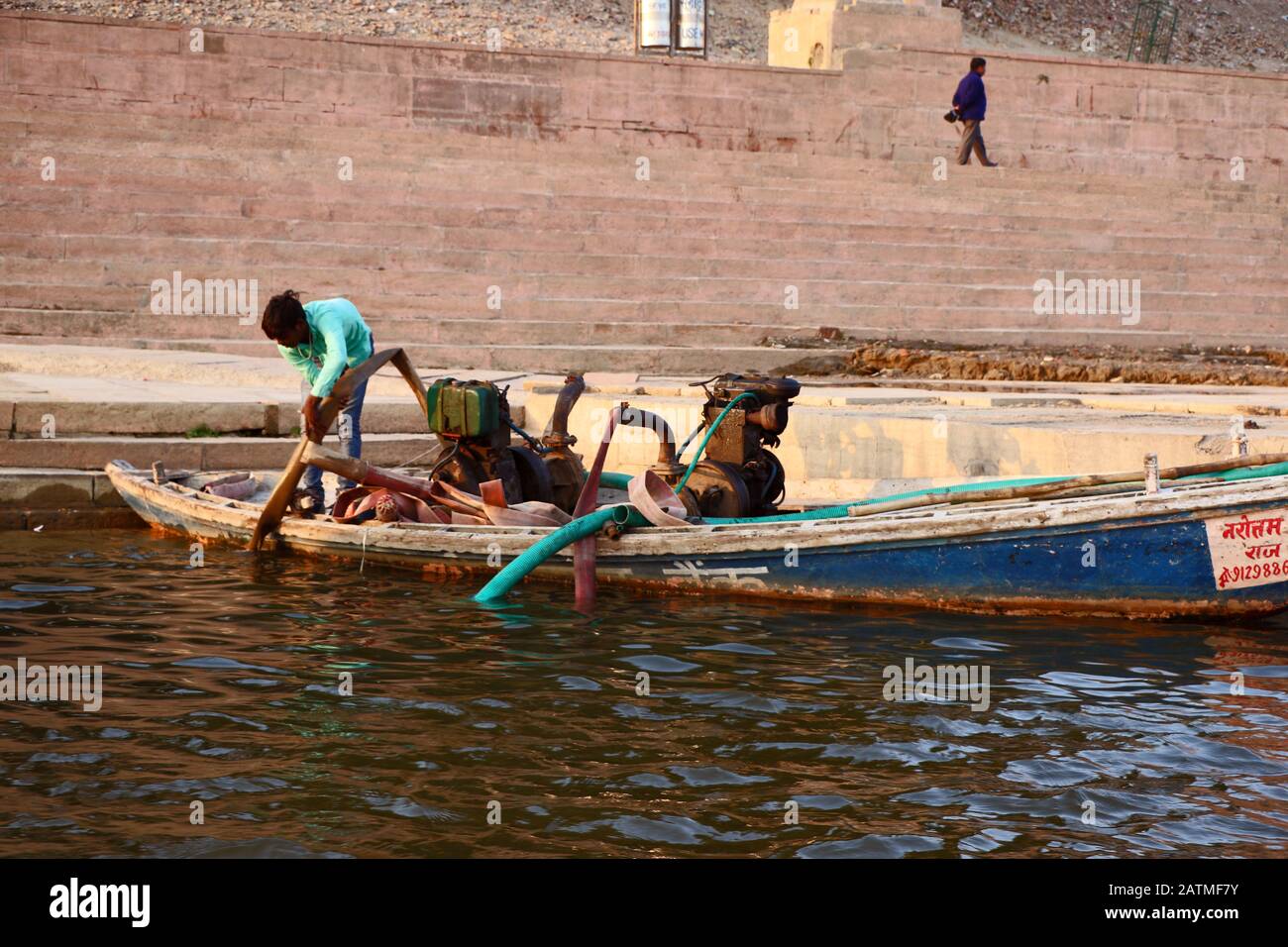 view of popular Assi Ghat with several pilgrims, that stands at the ...