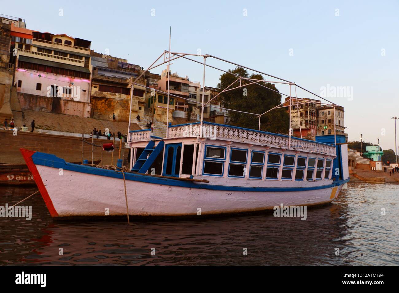 view of popular Assi Ghat with several pilgrims, that stands at the ...