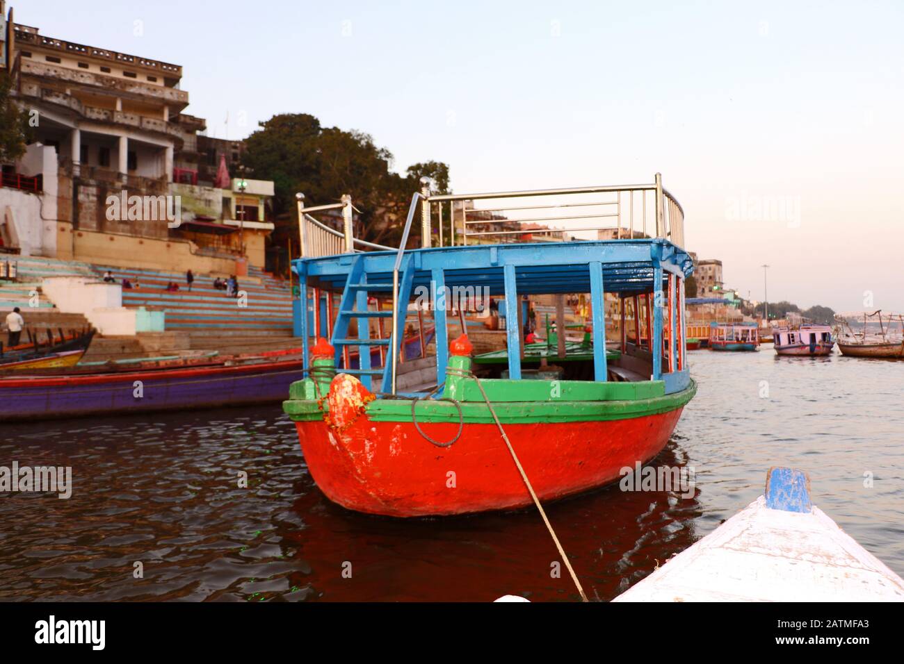 view of popular Assi Ghat with several pilgrims, that stands at the ...