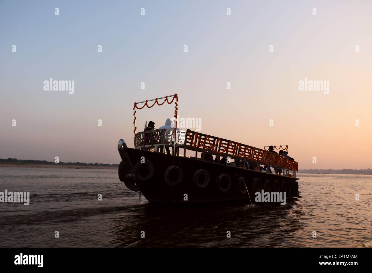 view of popular Assi Ghat with several pilgrims, that stands at the ...