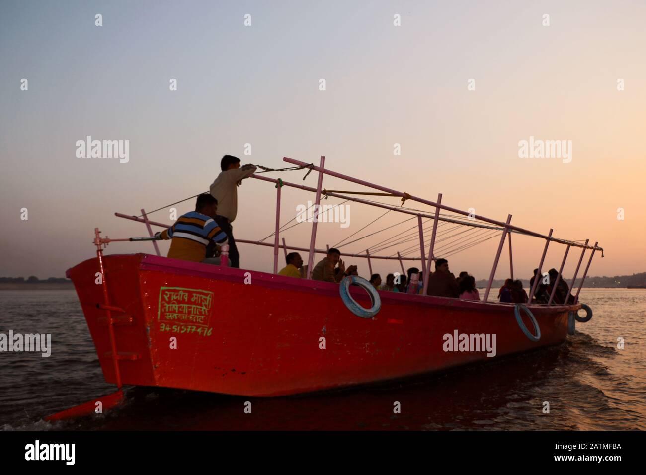 view of popular Assi Ghat with several pilgrims, that stands at the ...